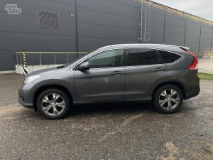 Grey Honda CR-V 2013 in Marijampole, with an engine capacity of 1.60 L and mileage of 238 thousand km for 7999 €, photo 4 on AUTOMOTO.COM.LV