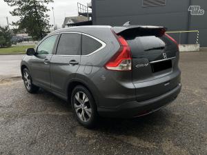 Grey Honda CR-V 2013 in Marijampole, with an engine capacity of 1.60 L and mileage of 238 thousand km for 7999 €, photo 5 on AUTOMOTO.COM.LV