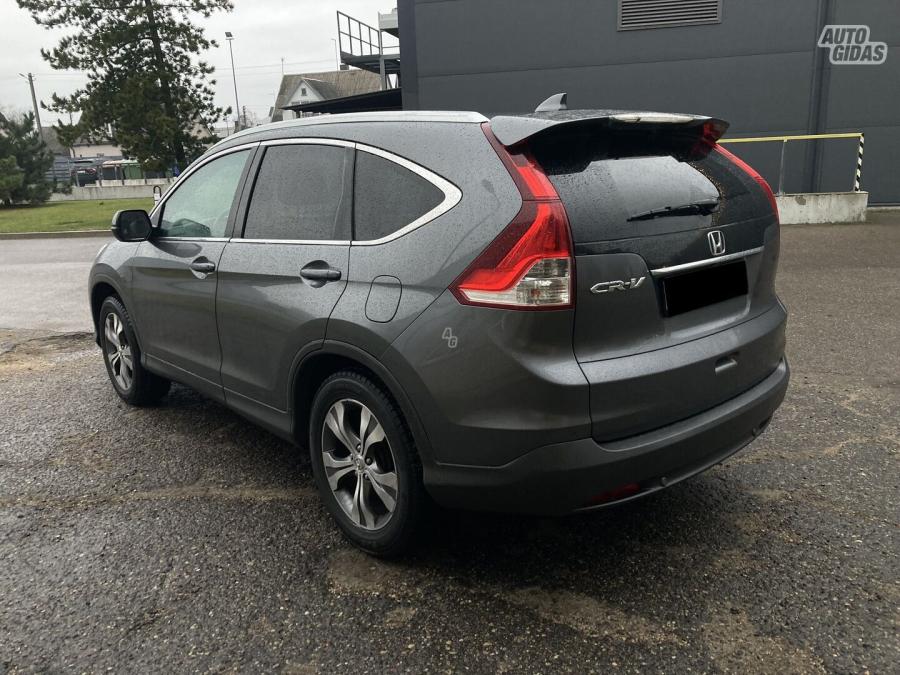 Grey Honda CR-V 2013 in Marijampole, with an engine capacity of 1.60 L and mileage of 238 thousand km for 7999 €, photo 5 on AUTOMOTO.COM.LV