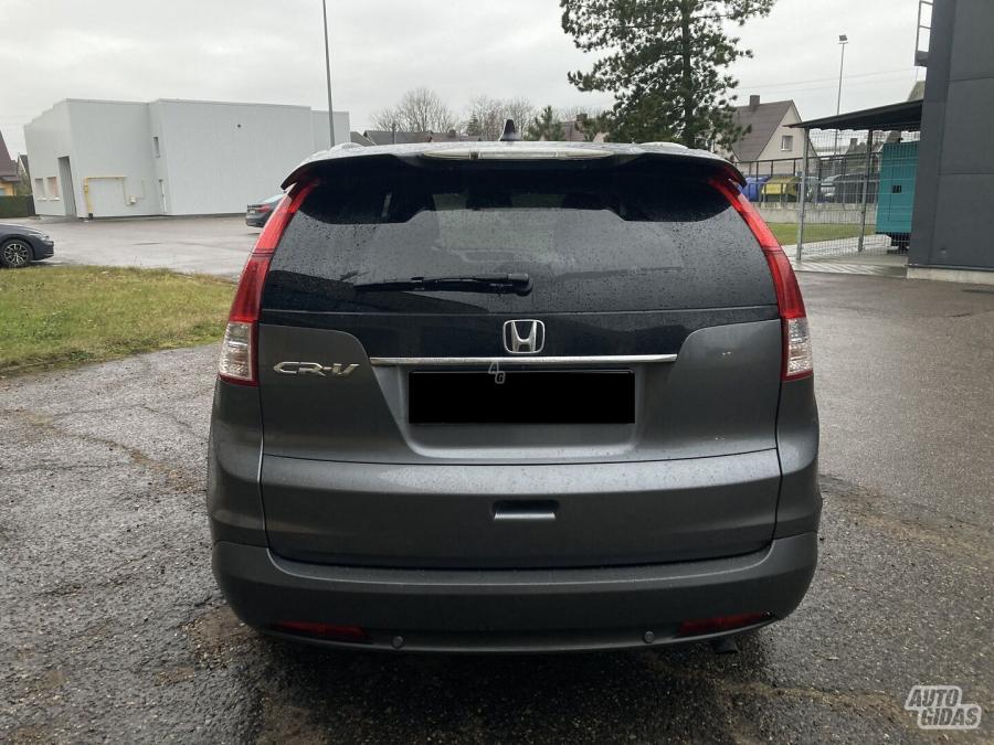 Grey Honda CR-V 2013 in Marijampole, with an engine capacity of 1.60 L and mileage of 238 thousand km for 7999 €, photo 6 on AUTOMOTO.COM.LV