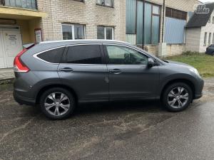 Grey Honda CR-V 2013 in Marijampole, with an engine capacity of 1.60 L and mileage of 238 thousand km for 7999 €, photo 8 on AUTOMOTO.COM.LV