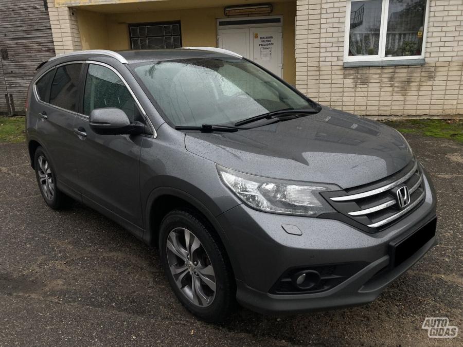 Grey Honda CR-V 2013 in Marijampole, with an engine capacity of 1.60 L and mileage of 238 thousand km for 7999 €, photo 9 on AUTOMOTO.COM.LV