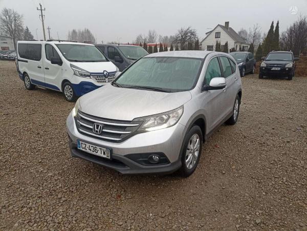 Grey Honda CR-V 2013 in Taurage, with an engine capacity of 2.00 L and mileage of 250 thousand km for 9200 €, photo 1 on AUTOMOTO.COM.LV