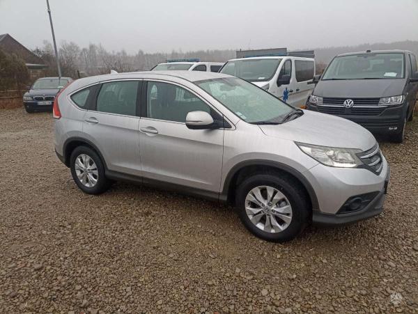 Grey Honda CR-V 2013 in Taurage, with an engine capacity of 2.00 L and mileage of 250 thousand km for 9200 €, photo 4 on AUTOMOTO.COM.LV
