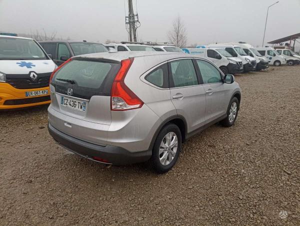 Grey Honda CR-V 2013 in Taurage, with an engine capacity of 2.00 L and mileage of 250 thousand km for 9200 €, photo 5 on AUTOMOTO.COM.LV