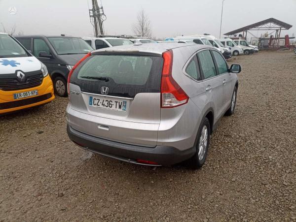 Grey Honda CR-V 2013 in Taurage, with an engine capacity of 2.00 L and mileage of 250 thousand km for 9200 €, photo 6 on AUTOMOTO.COM.LV