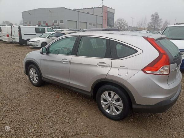 Grey Honda CR-V 2013 in Taurage, with an engine capacity of 2.00 L and mileage of 250 thousand km for 9200 €, photo 8 on AUTOMOTO.COM.LV