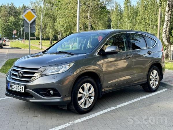 Pelēks Honda CR-V 2013 Rīga, ar dzinēja tilpumu 2.00 L un nobraukumu 270 tūkst. km par 8950 €, foto 1 vietnē AUTOMOTO.COM.LV