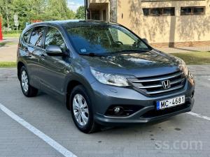 Grey Honda CR-V 2013 in Riga, with an engine capacity of 2.00 L and mileage of 270 thousand km for 8950 €, photo 3 on AUTOMOTO.COM.LV