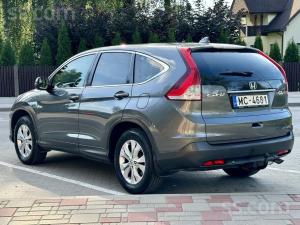 Grey Honda CR-V 2013 in Riga, with an engine capacity of 2.00 L and mileage of 270 thousand km for 8950 €, photo 4 on AUTOMOTO.COM.LV
