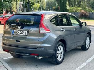 Grey Honda CR-V 2013 in Riga, with an engine capacity of 2.00 L and mileage of 270 thousand km for 8950 €, photo 5 on AUTOMOTO.COM.LV