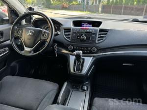 Grey Honda CR-V 2013 in Riga, with an engine capacity of 2.00 L and mileage of 270 thousand km for 8950 €, photo 8 on AUTOMOTO.COM.LV