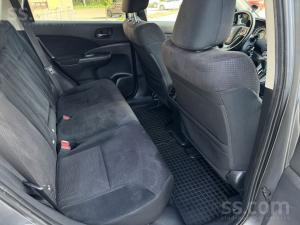 Grey Honda CR-V 2013 in Riga, with an engine capacity of 2.00 L and mileage of 270 thousand km for 8950 €, photo 9 on AUTOMOTO.COM.LV