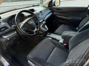 Grey Honda CR-V 2013 in Riga, with an engine capacity of 2.00 L and mileage of 270 thousand km for 8950 €, photo 17 on AUTOMOTO.COM.LV