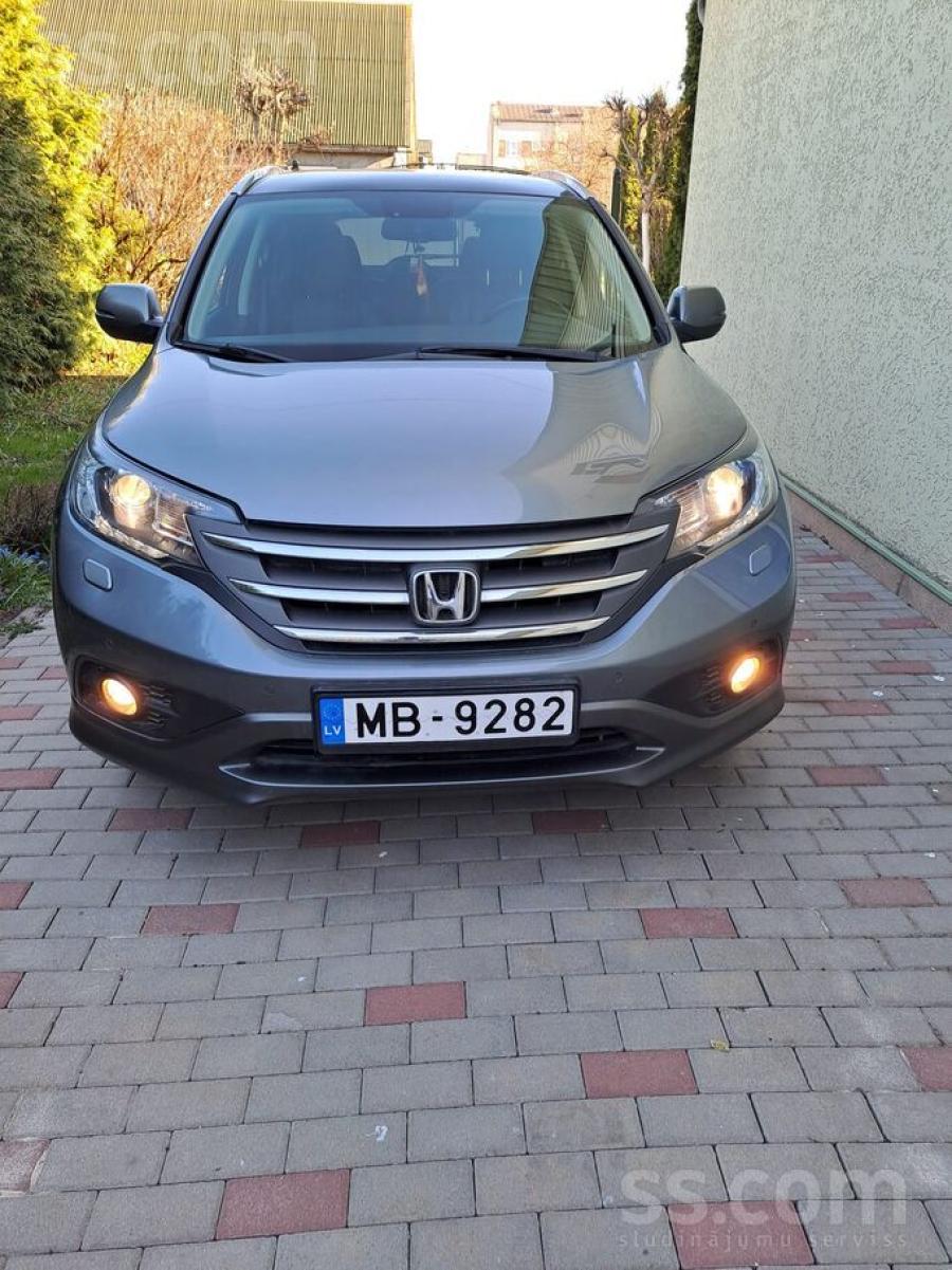 Grey Honda CR-V 2013 in Riga, with an engine capacity of 2.20 L and mileage of 0 thousand km for 10800 €, photo 1 on AUTOMOTO.COM.LV