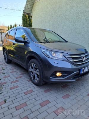 Grey Honda CR-V 2013 in Riga, with an engine capacity of 2.20 L and mileage of 0 thousand km for 10800 €, photo 3 on AUTOMOTO.COM.LV