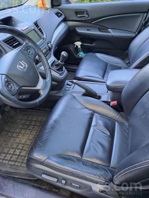 Grey Honda CR-V 2013 in Riga, with an engine capacity of 2.20 L and mileage of 0 thousand km for 10800 €, photo 6 on AUTOMOTO.COM.LV