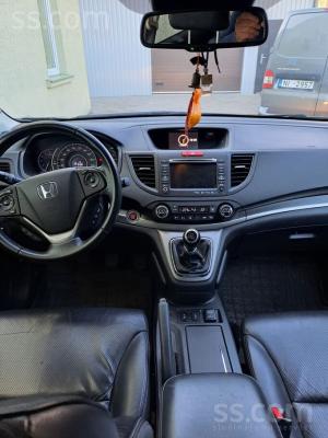 Grey Honda CR-V 2013 in Riga, with an engine capacity of 2.20 L and mileage of 0 thousand km for 10800 €, photo 7 on AUTOMOTO.COM.LV