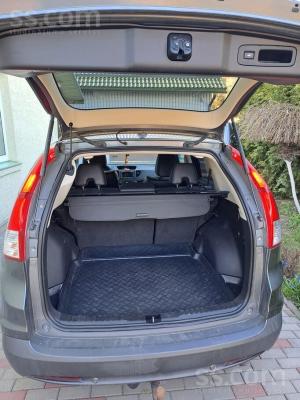 Grey Honda CR-V 2013 in Riga, with an engine capacity of 2.20 L and mileage of 0 thousand km for 10800 €, photo 10 on AUTOMOTO.COM.LV