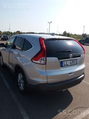 Grey Honda CR-V 2013 in Daugavpils, with an engine capacity of 2.20 L and mileage of 188 thousand km for 15400 €, photo 4 on AUTOMOTO.COM.LV