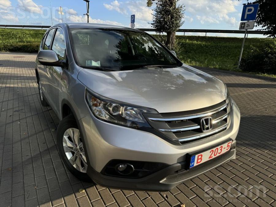 Pelēks Honda CR-V 2013 Daugavpils, ar dzinēja tilpumu 2.20 L un nobraukumu 209 tūkst. km par 11950 €, foto 1 vietnē AUTOMOTO.COM.LV