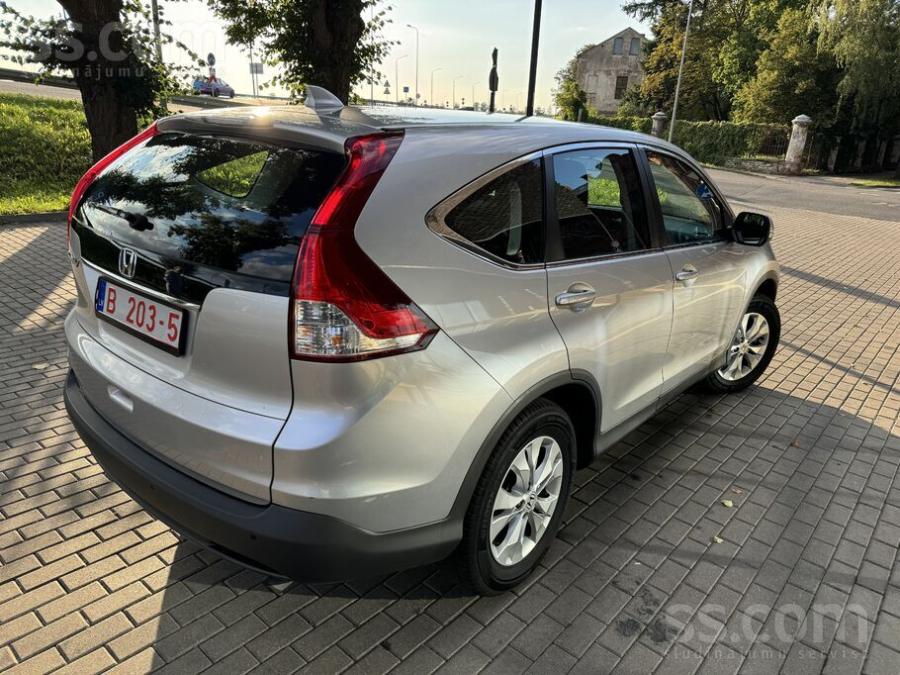 Pelēks Honda CR-V 2013 Daugavpils, ar dzinēja tilpumu 2.20 L un nobraukumu 209 tūkst. km par 11950 €, foto 5 vietnē AUTOMOTO.COM.LV