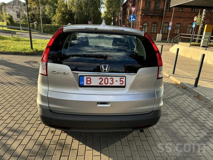 Pelēks Honda CR-V 2013 Daugavpils, ar dzinēja tilpumu 2.20 L un nobraukumu 209 tūkst. km par 11950 €, foto 6 vietnē AUTOMOTO.COM.LV