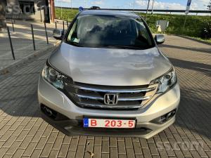 Pelēks Honda CR-V 2013 Daugavpils, ar dzinēja tilpumu 2.20 L un nobraukumu 209 tūkst. km par 11950 €, foto 9 vietnē AUTOMOTO.COM.LV