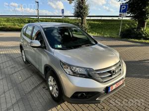 Pelēks Honda CR-V 2013 Daugavpils, ar dzinēja tilpumu 2.20 L un nobraukumu 209 tūkst. km par 11950 €, foto 10 vietnē AUTOMOTO.COM.LV