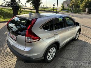 Pelēks Honda CR-V 2013 Daugavpils, ar dzinēja tilpumu 2.20 L un nobraukumu 209 tūkst. km par 11950 €, foto 12 vietnē AUTOMOTO.COM.LV