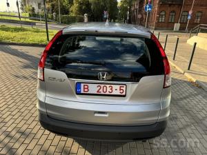 Pelēks Honda CR-V 2013 Daugavpils, ar dzinēja tilpumu 2.20 L un nobraukumu 209 tūkst. km par 11950 €, foto 13 vietnē AUTOMOTO.COM.LV