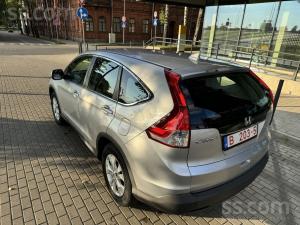 Pelēks Honda CR-V 2013 Daugavpils, ar dzinēja tilpumu 2.20 L un nobraukumu 209 tūkst. km par 11950 €, foto 14 vietnē AUTOMOTO.COM.LV