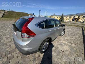 Pelēks Honda CR-V 2013 Daugavpils, ar dzinēja tilpumu 2.20 L un nobraukumu 209 tūkst. km par 11950 €, foto 17 vietnē AUTOMOTO.COM.LV