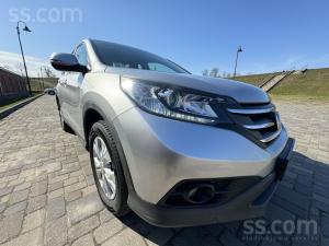 Pelēks Honda CR-V 2013 Daugavpils, ar dzinēja tilpumu 2.20 L un nobraukumu 209 tūkst. km par 11950 €, foto 18 vietnē AUTOMOTO.COM.LV