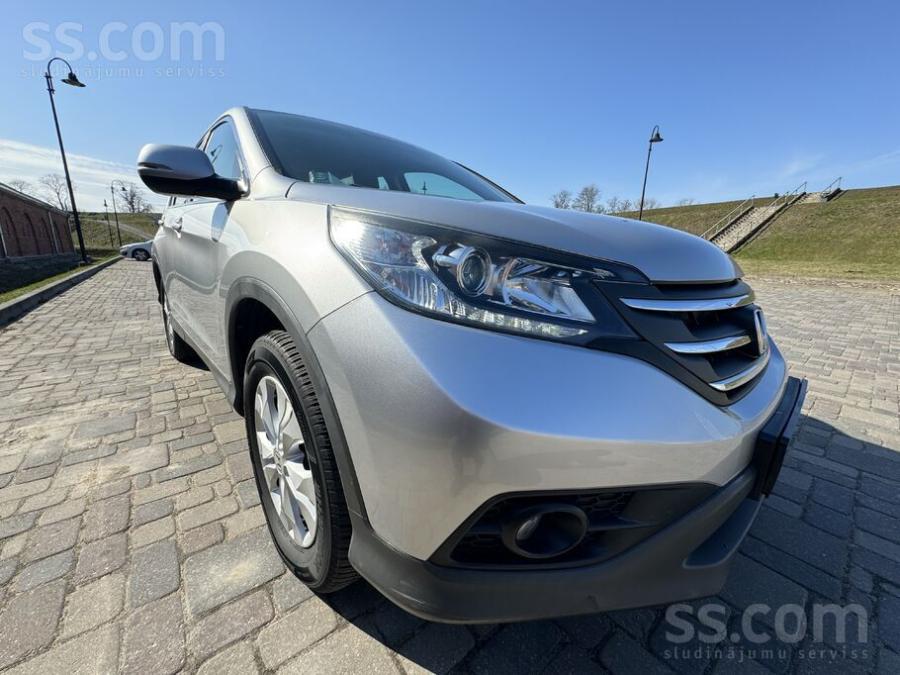 Pelēks Honda CR-V 2013 Daugavpils, ar dzinēja tilpumu 2.20 L un nobraukumu 209 tūkst. km par 11950 €, foto 18 vietnē AUTOMOTO.COM.LV