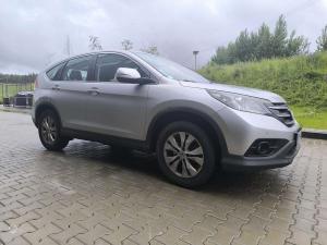 Grey Honda CR-V 2013 in Vilnius, with an engine capacity of 2.20 L and mileage of 228 thousand km for 8300 €, photo 3 on AUTOMOTO.COM.LV