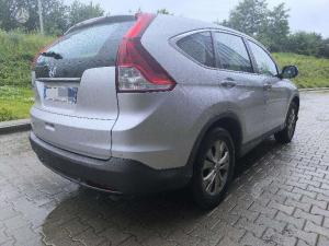 Grey Honda CR-V 2013 in Vilnius, with an engine capacity of 2.20 L and mileage of 228 thousand km for 8300 €, photo 6 on AUTOMOTO.COM.LV