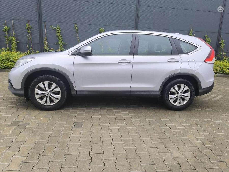 Grey Honda CR-V 2013 in Vilnius, with an engine capacity of 2.20 L and mileage of 228 thousand km for 8300 €, photo 8 on AUTOMOTO.COM.LV
