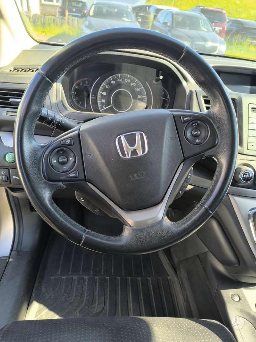 Grey Honda CR-V 2013 in Vilnius, with an engine capacity of 2.20 L and mileage of 228 thousand km for 8300 €, photo 13 on AUTOMOTO.COM.LV