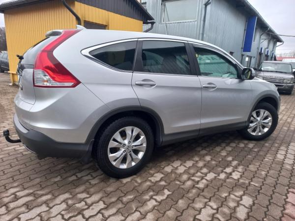 Grey Honda CR-V 2013 in Riga, with an engine capacity of 2.20 L and mileage of 240 thousand km for 9900 €, photo 5 on AUTOMOTO.COM.LV