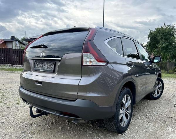 Grey Honda CR-V 2013 in Kaisiadorys, with an engine capacity of 2.20 L and mileage of 286 thousand km for 7850 €, photo 4 on AUTOMOTO.COM.LV