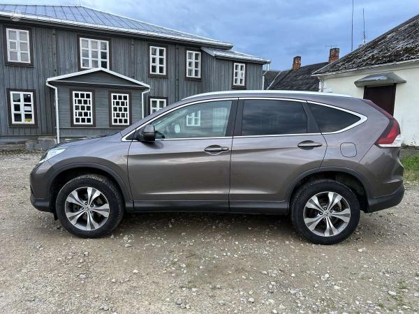 Grey Honda CR-V 2013 in Kaisiadorys, with an engine capacity of 2.20 L and mileage of 286 thousand km for 7850 €, photo 6 on AUTOMOTO.COM.LV