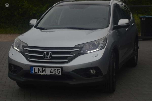 Grey Honda CR-V 2013 in Vilnius, with an engine capacity of 2.20 L and mileage of 213 thousand km for 11500 €, photo 2 on AUTOMOTO.COM.LV