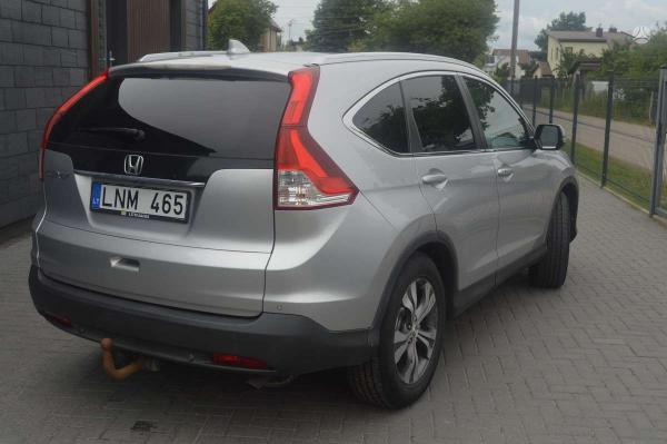 Grey Honda CR-V 2013 in Vilnius, with an engine capacity of 2.20 L and mileage of 213 thousand km for 11500 €, photo 4 on AUTOMOTO.COM.LV