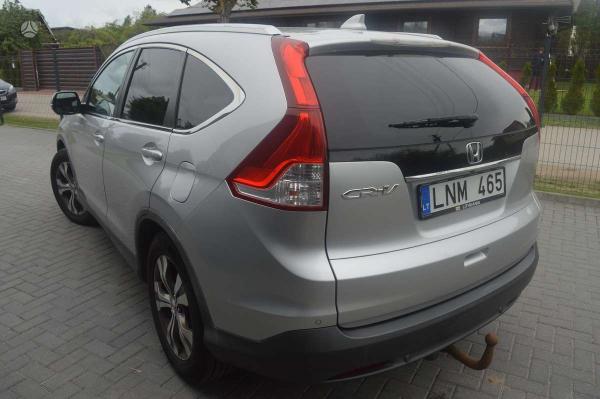 Grey Honda CR-V 2013 in Vilnius, with an engine capacity of 2.20 L and mileage of 213 thousand km for 11500 €, photo 5 on AUTOMOTO.COM.LV