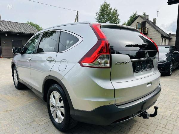Grey Honda CR-V 2013 in Kaunas, with an engine capacity of 2.20 L and mileage of 270 thousand km for 8950 €, photo 4 on AUTOMOTO.COM.LV
