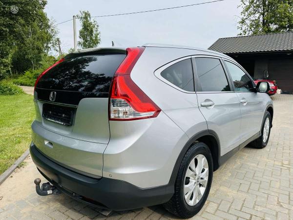 Grey Honda CR-V 2013 in Kaunas, with an engine capacity of 2.20 L and mileage of 270 thousand km for 8950 €, photo 6 on AUTOMOTO.COM.LV