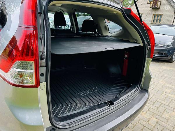 Grey Honda CR-V 2013 in Kaunas, with an engine capacity of 2.20 L and mileage of 270 thousand km for 8950 €, photo 8 on AUTOMOTO.COM.LV
