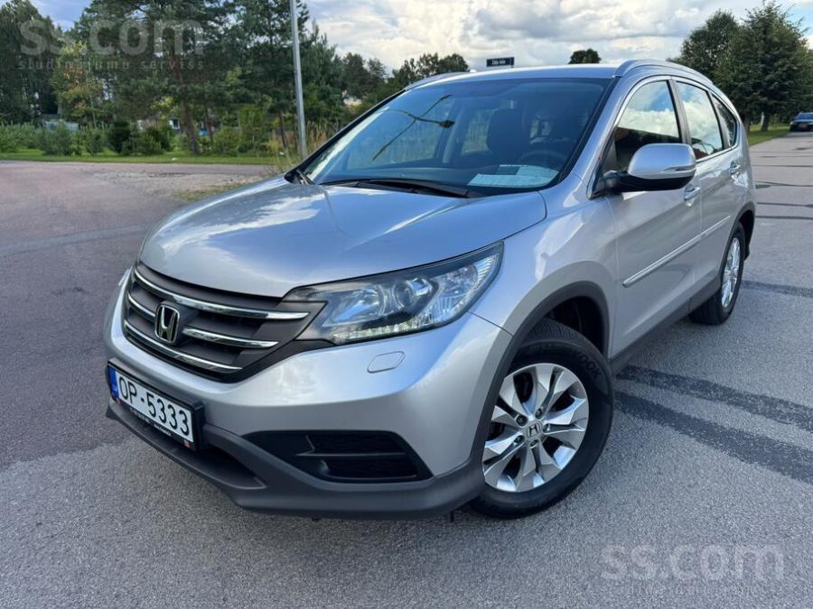 Grey Honda CR-V 2013 in Ogre, with an engine capacity of 2.00 L and mileage of 258 thousand km for 8550 €, photo 1 on AUTOMOTO.COM.LV