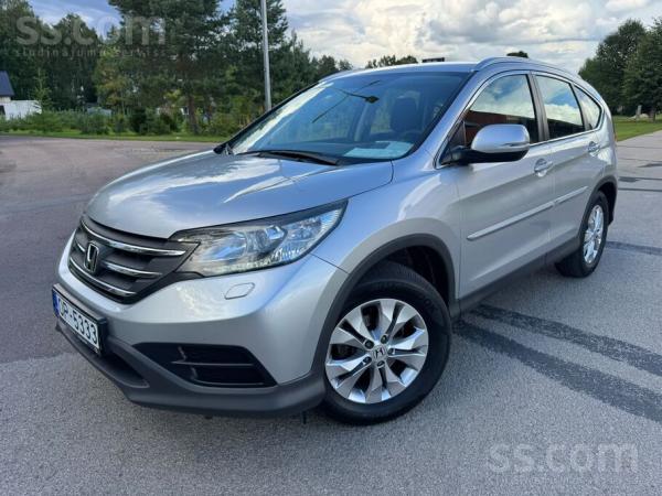 Grey Honda CR-V 2013 in Ogre, with an engine capacity of 2.00 L and mileage of 258 thousand km for 8550 €, photo 2 on AUTOMOTO.COM.LV